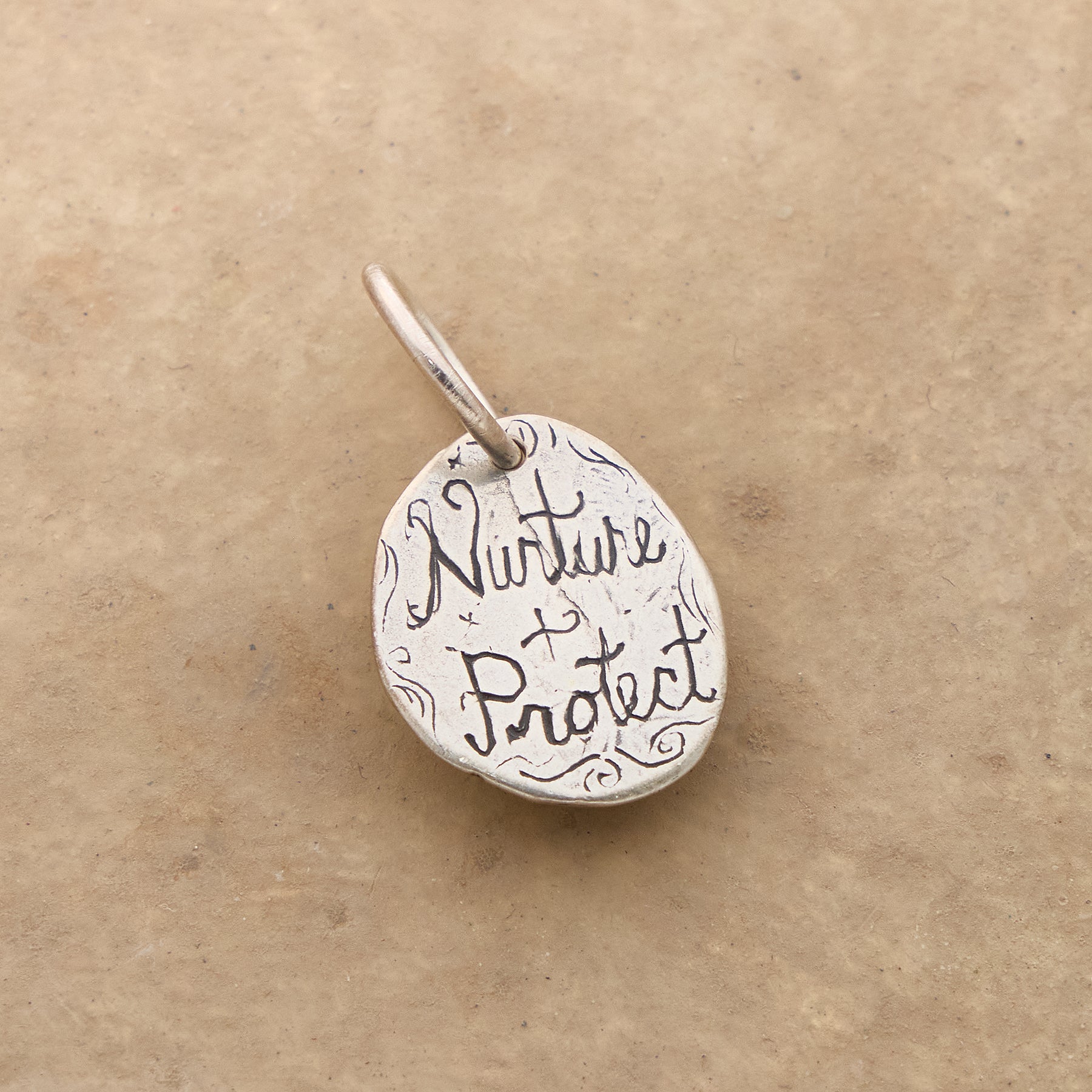 Sterling Silver Nurture + Protect Charm – Sundance